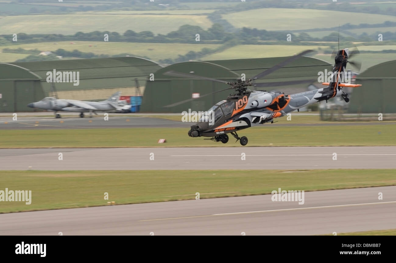 Dutch Air Force Apache Helicopter in forward flight above runway prior ...