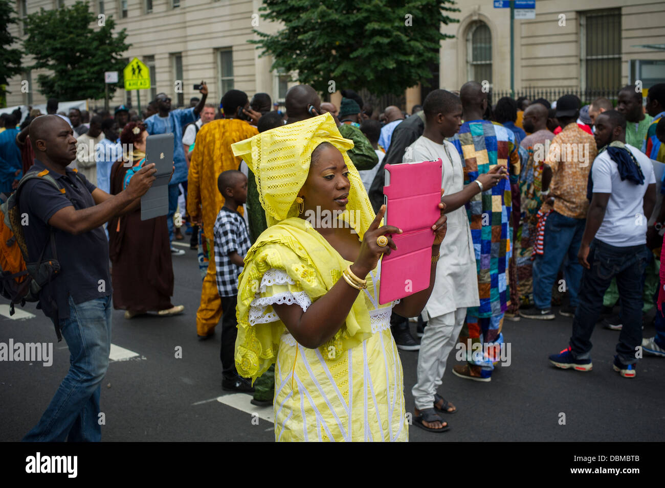 Sengalese immigrants participate in a parade in Harlem in New York ...