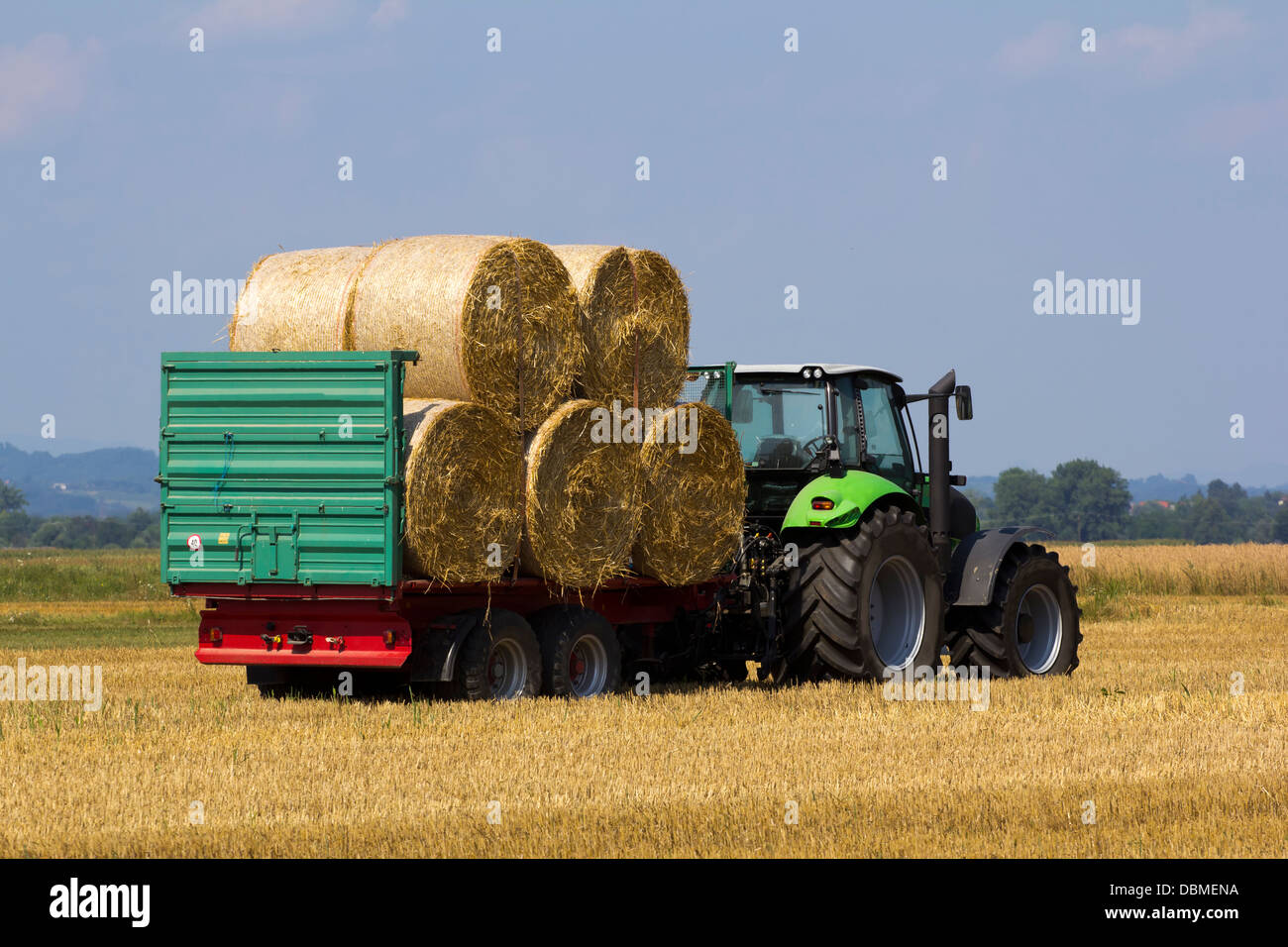 Harvest hay tractor hi-res stock photography and images - Alamy