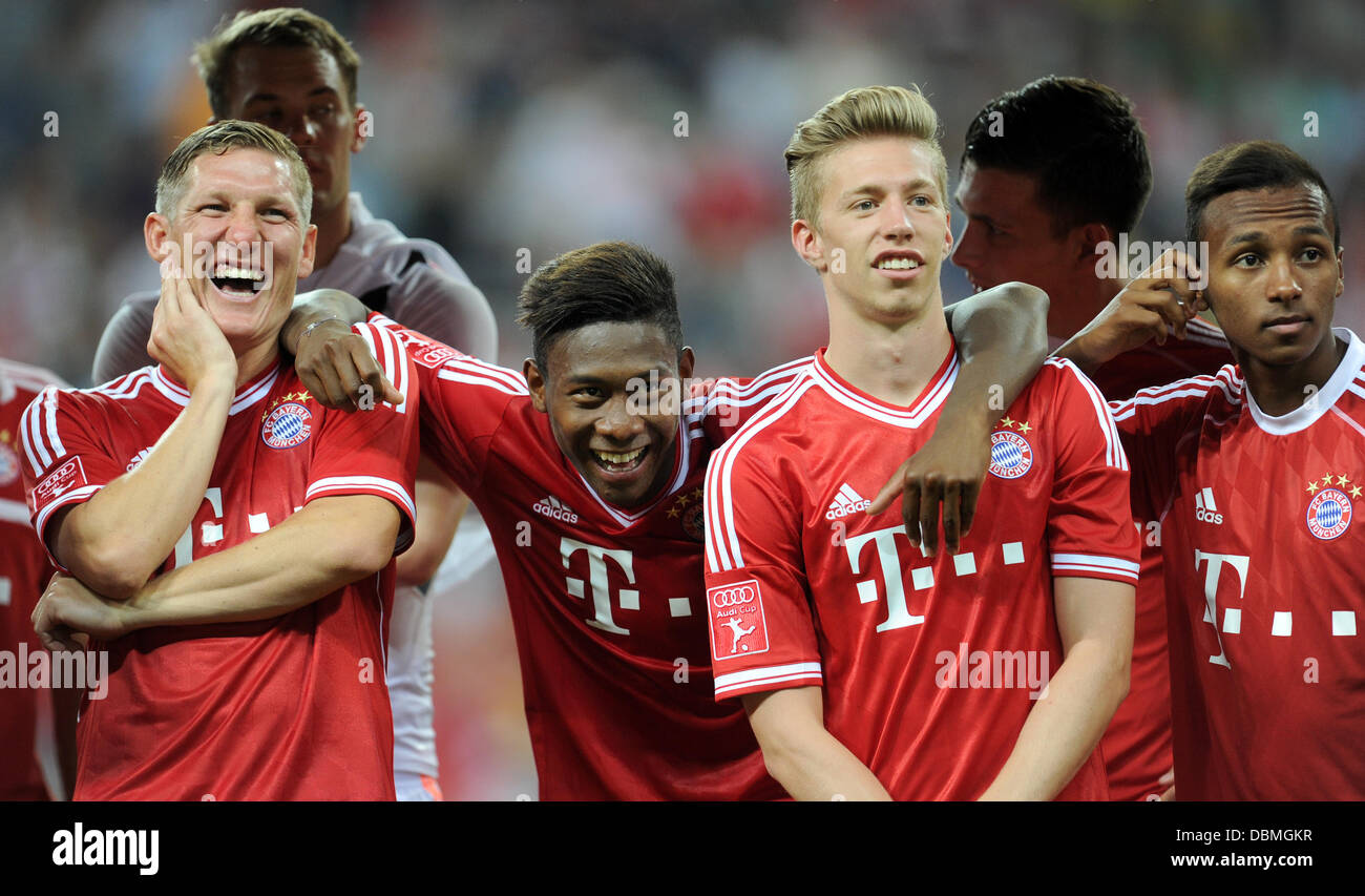 Munich, Germany. 01st Aug, 2013. Munich's Bastian Schweinsteiger, David ...