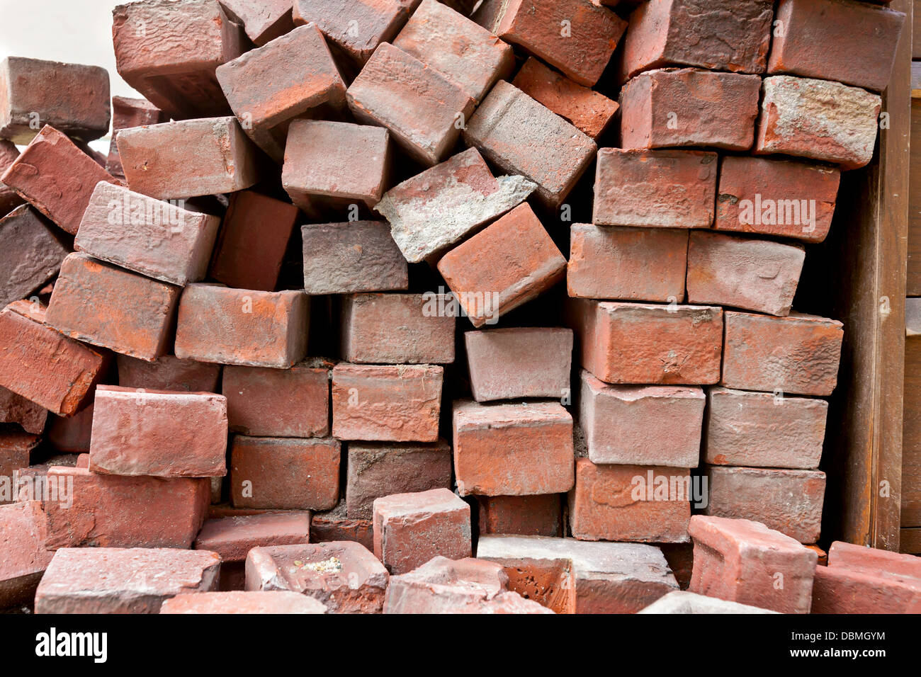 Pile of red construction bricks Stock Photo - Alamy