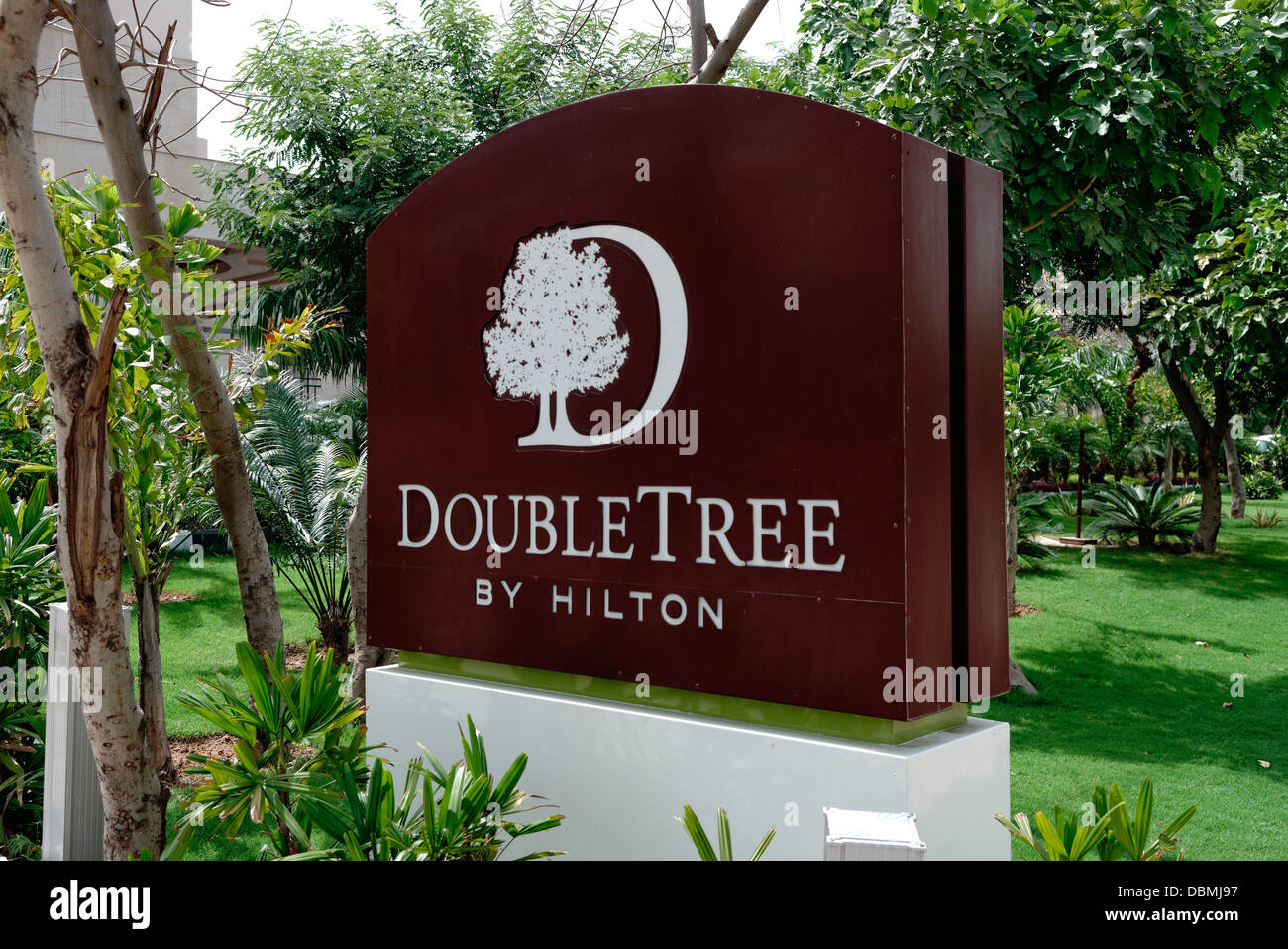 Signpost Hilton Doubletree Hotel Gurgaon Haryana india Stock Photo - Alamy