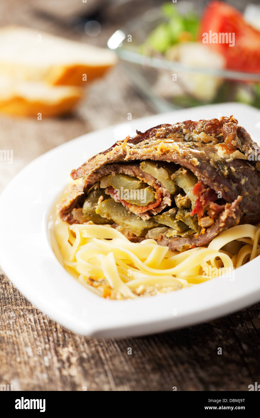 bavarian meat roulade filled with ham and gherkin Stock Photo - Alamy
