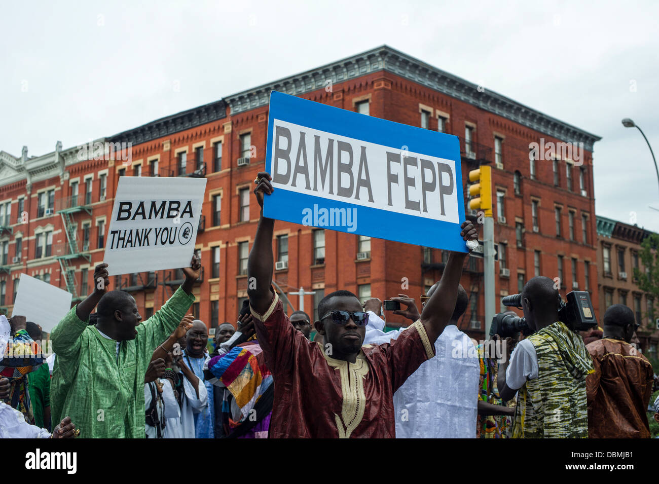 Sengalese immigrants participate in a parade in Harlem in New York ...