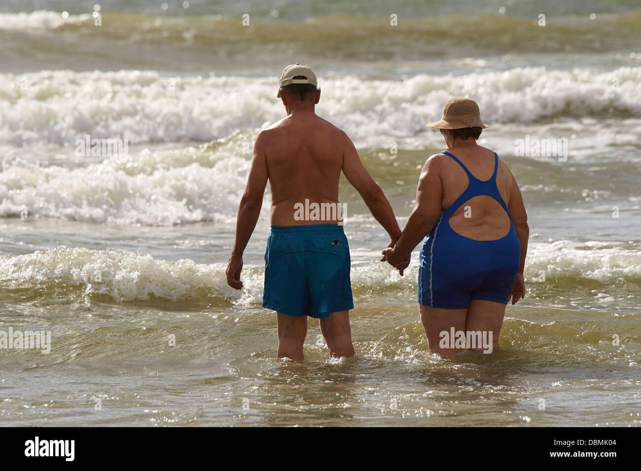 Taking a bath in the waves Stock Photo - Alamy