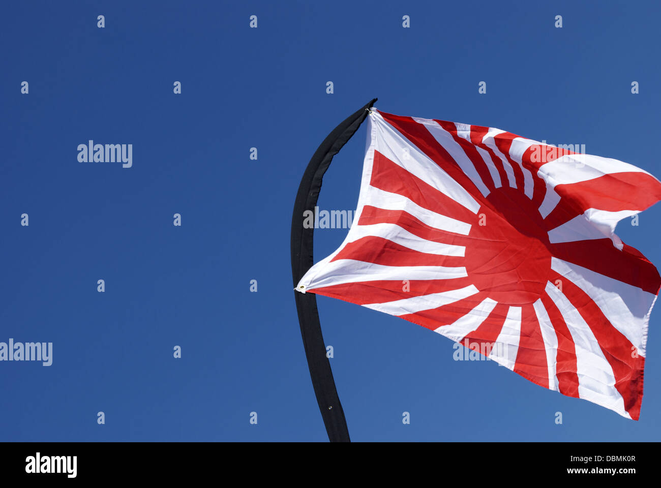 Japanese flag on flag pole hi-res stock photography and images - Alamy