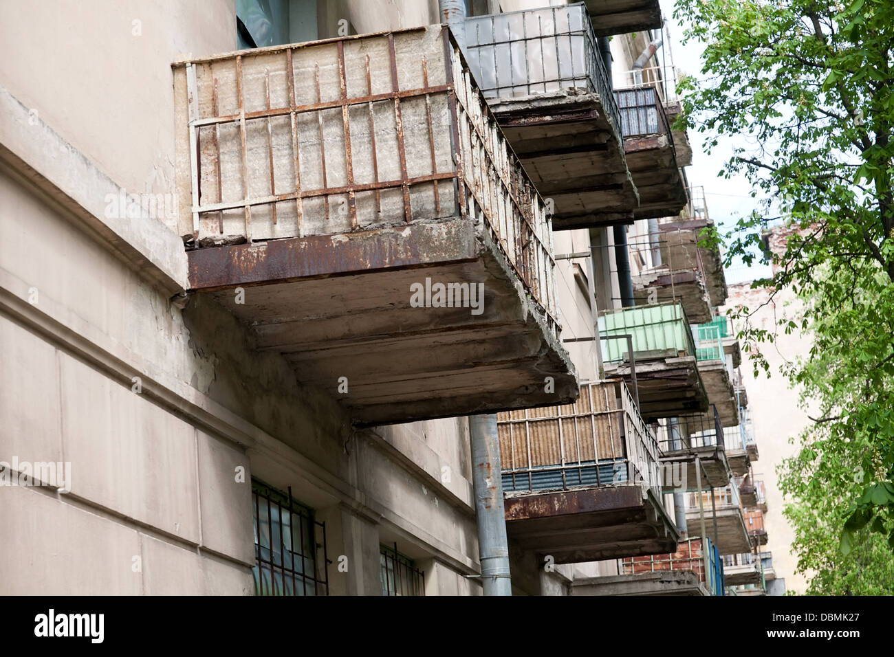 wall with balconies of old abandoned soviet house closeup Stock Photo ...