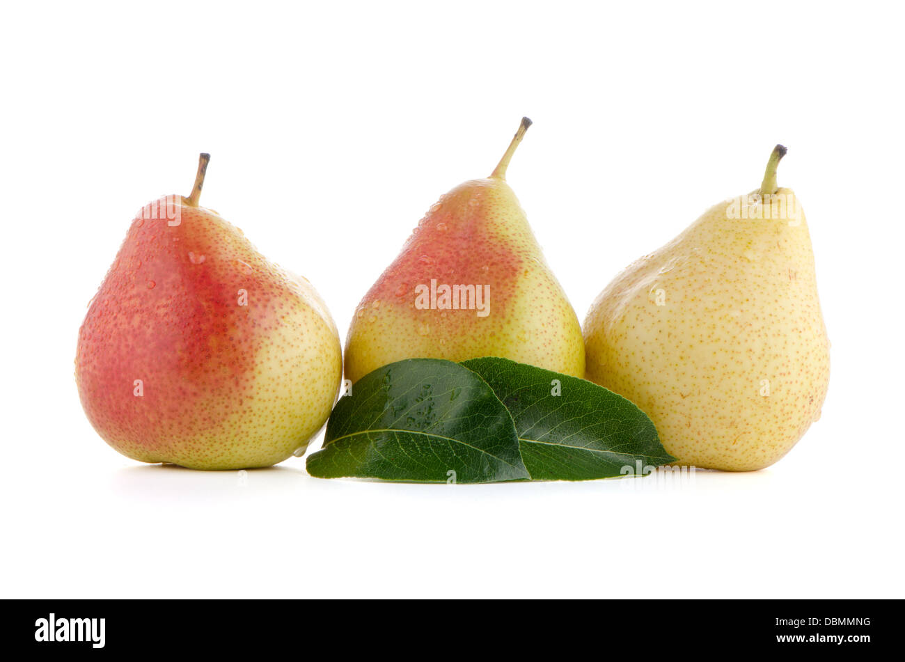 Three ripe pears isolated on white background Stock Photo - Alamy