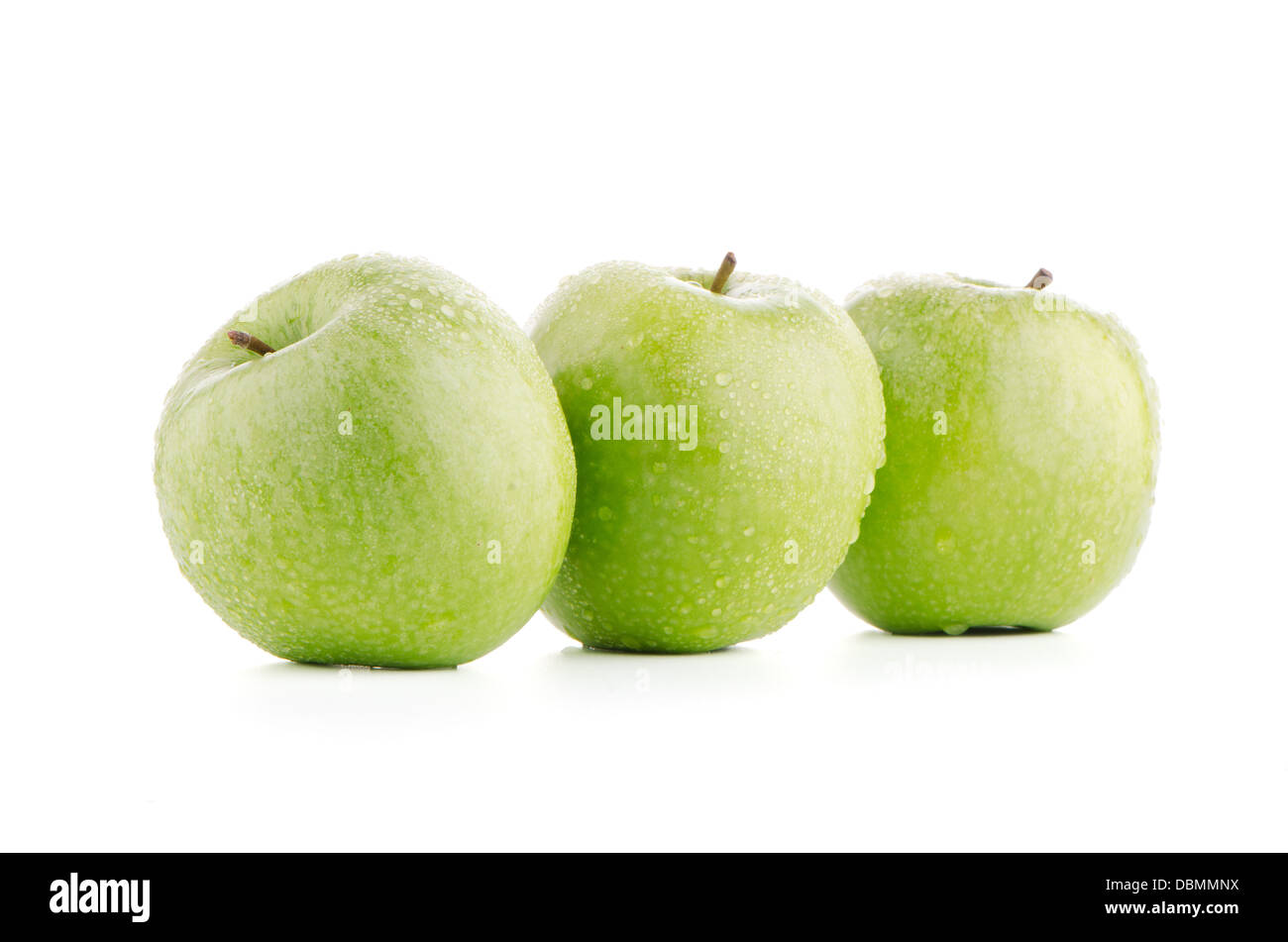 Three fresh green apples on white background Stock Photo - Alamy