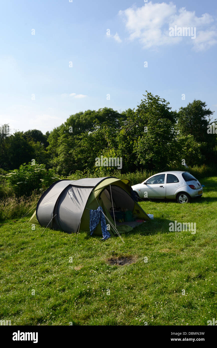 Camp site with tent in an open field, Blue sky, England, Britain, UK ...