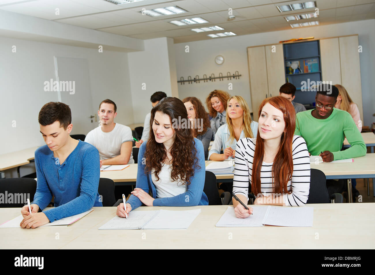 Many people doing further training in a school classroom Stock Photo ...