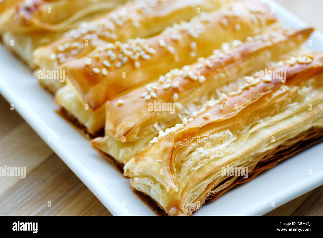 Just baked crunchy puff pastry on the white table Stock Photo - Alamy