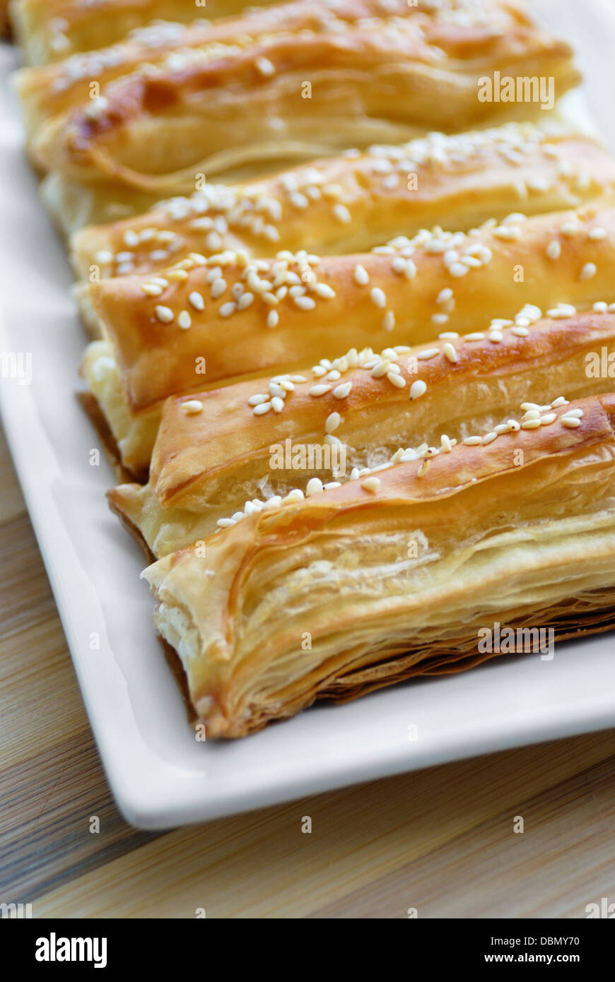 Just baked crunchy puff pastry on the white table Stock Photo - Alamy