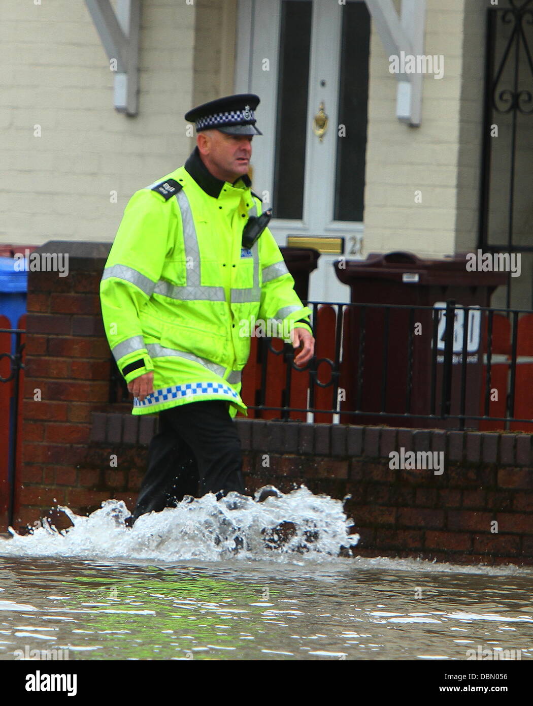 Burst water main causes flood chaos in Huyton area of Liverpool. A ...