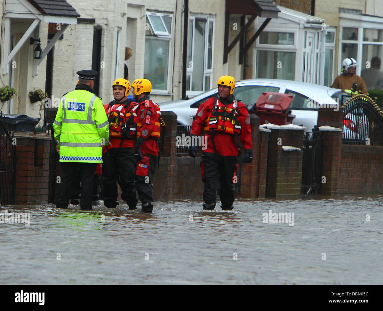 Burst water main causes flood chaos in Huyton area of Liverpool. A ...