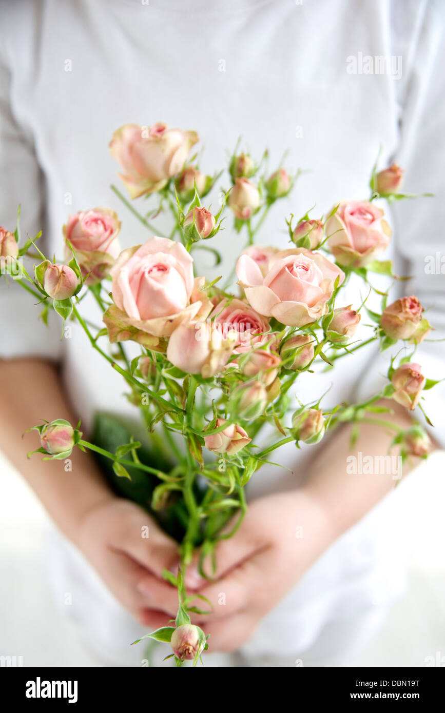 Holding bunch flowers hi-res stock photography and images - Alamy
