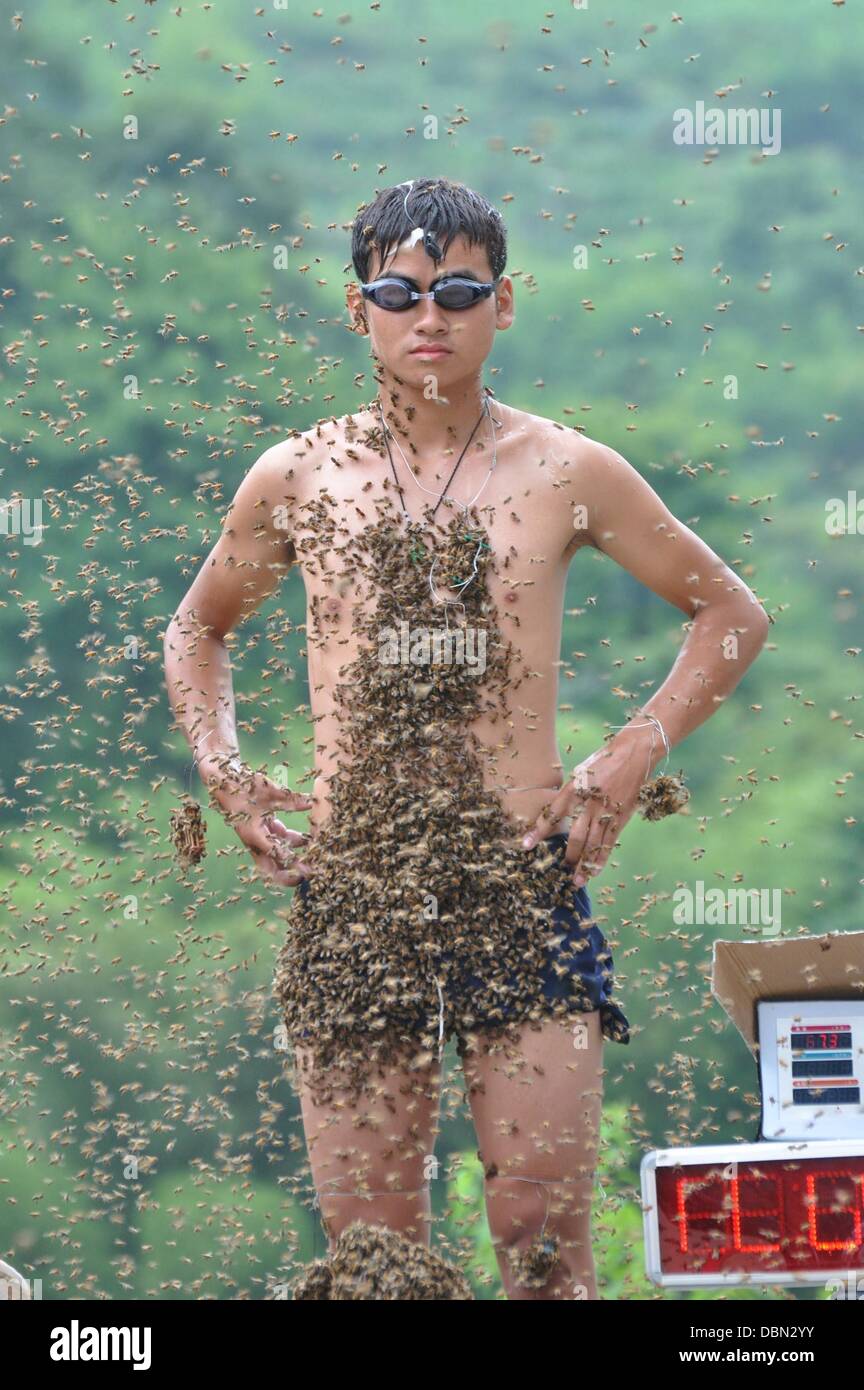 A day buzzing with competition.... Beekeepers Wang Dalin and Lu ...