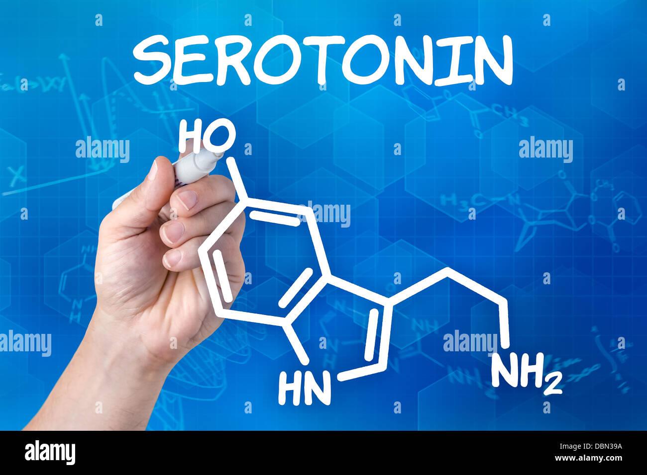 hand with pen drawing the chemical formula of serotonin Stock Photo - Alamy