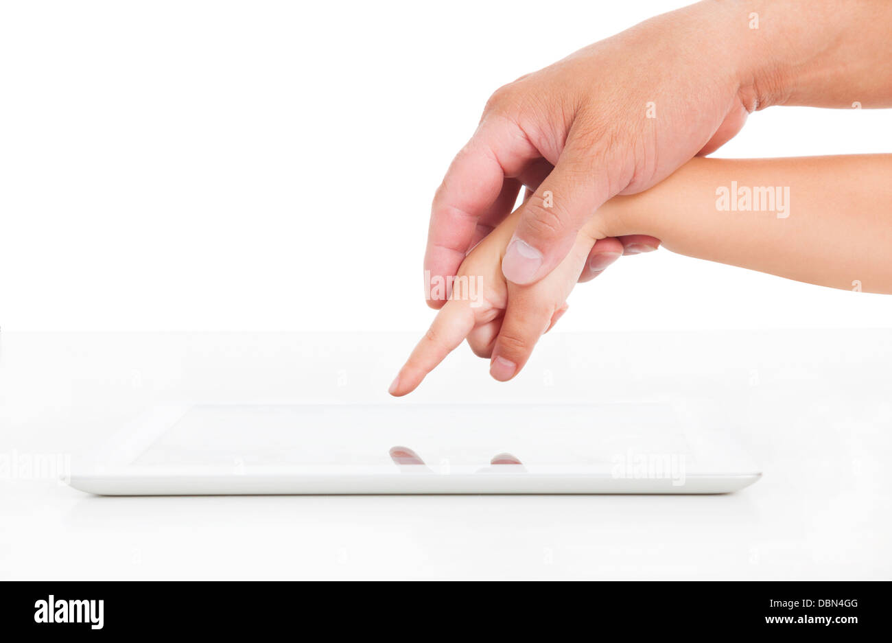 father holding little girl's hand touching the tablet pc Stock Photo ...