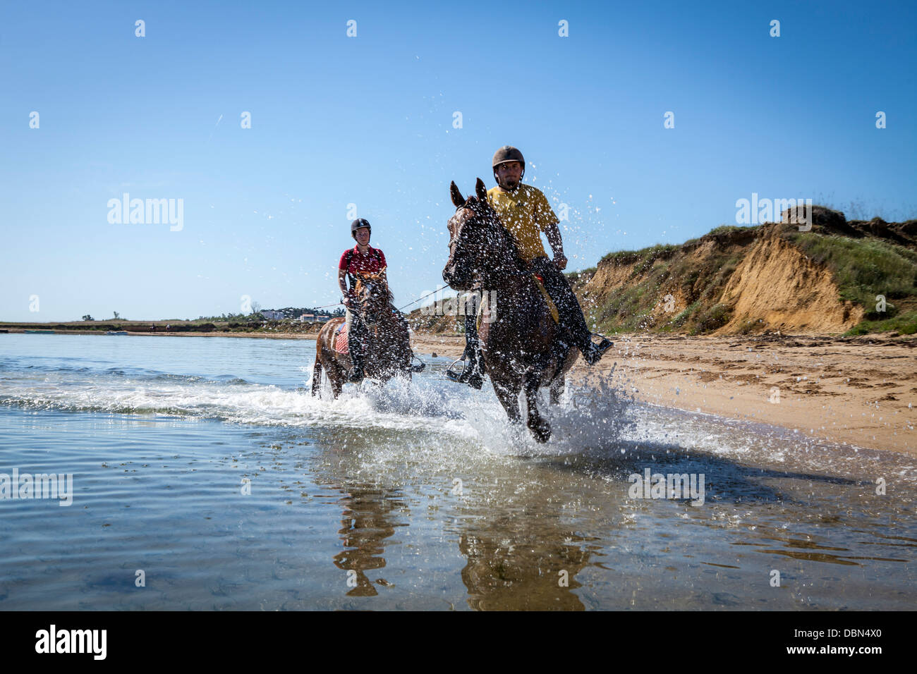 Horse riding in the sea hi-res stock photography and images - Alamy