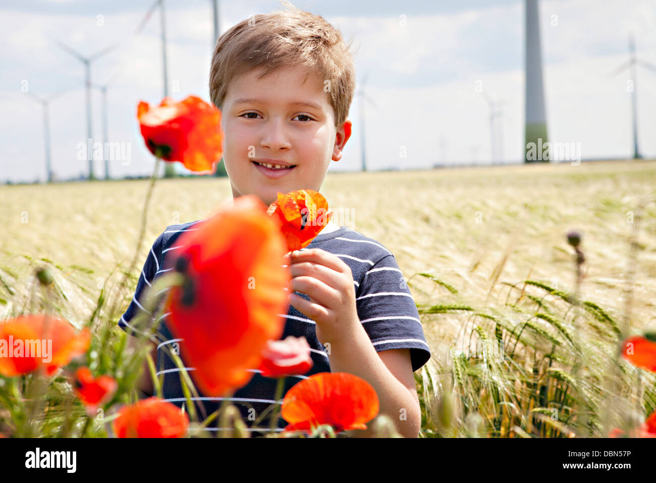 Children with wind turbines hi-res stock photography and images - Alamy