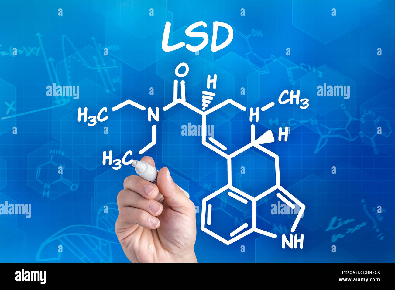 hand with pen drawing the chemical formula of lsd Stock Photo - Alamy