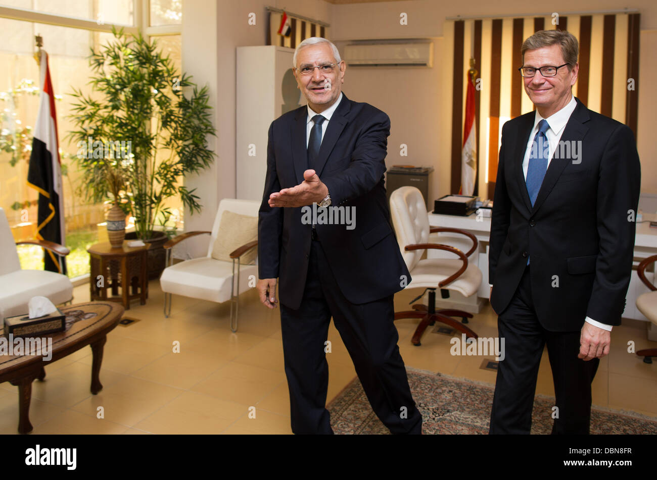 German Foreign Minister Guido Westerwelle (FDP, R) talks to the ...
