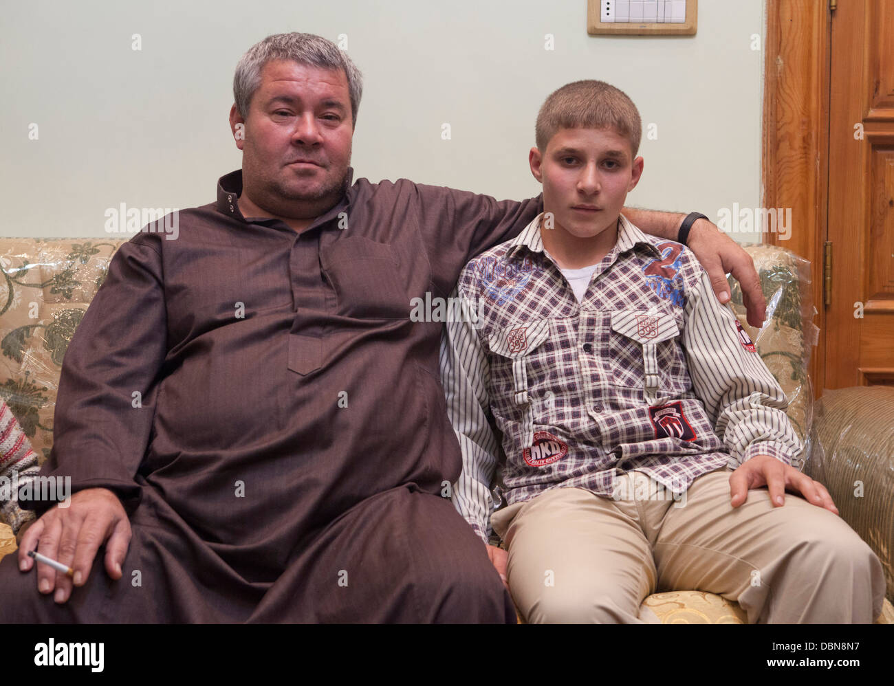 A father and 14 year old son celebrate the son's wedding to a 13 year ...