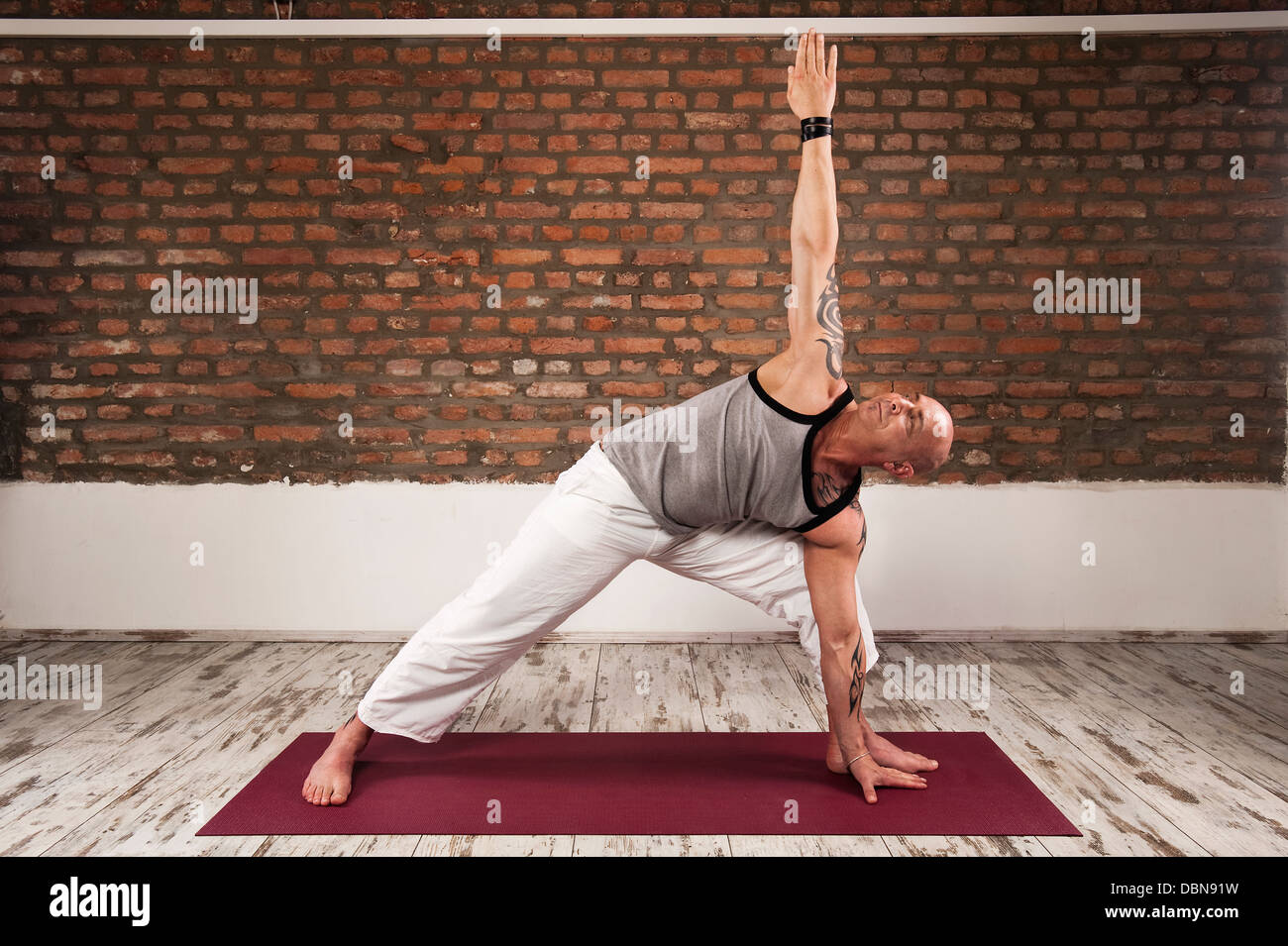 Man Practising Yoga Stock Photo - Alamy