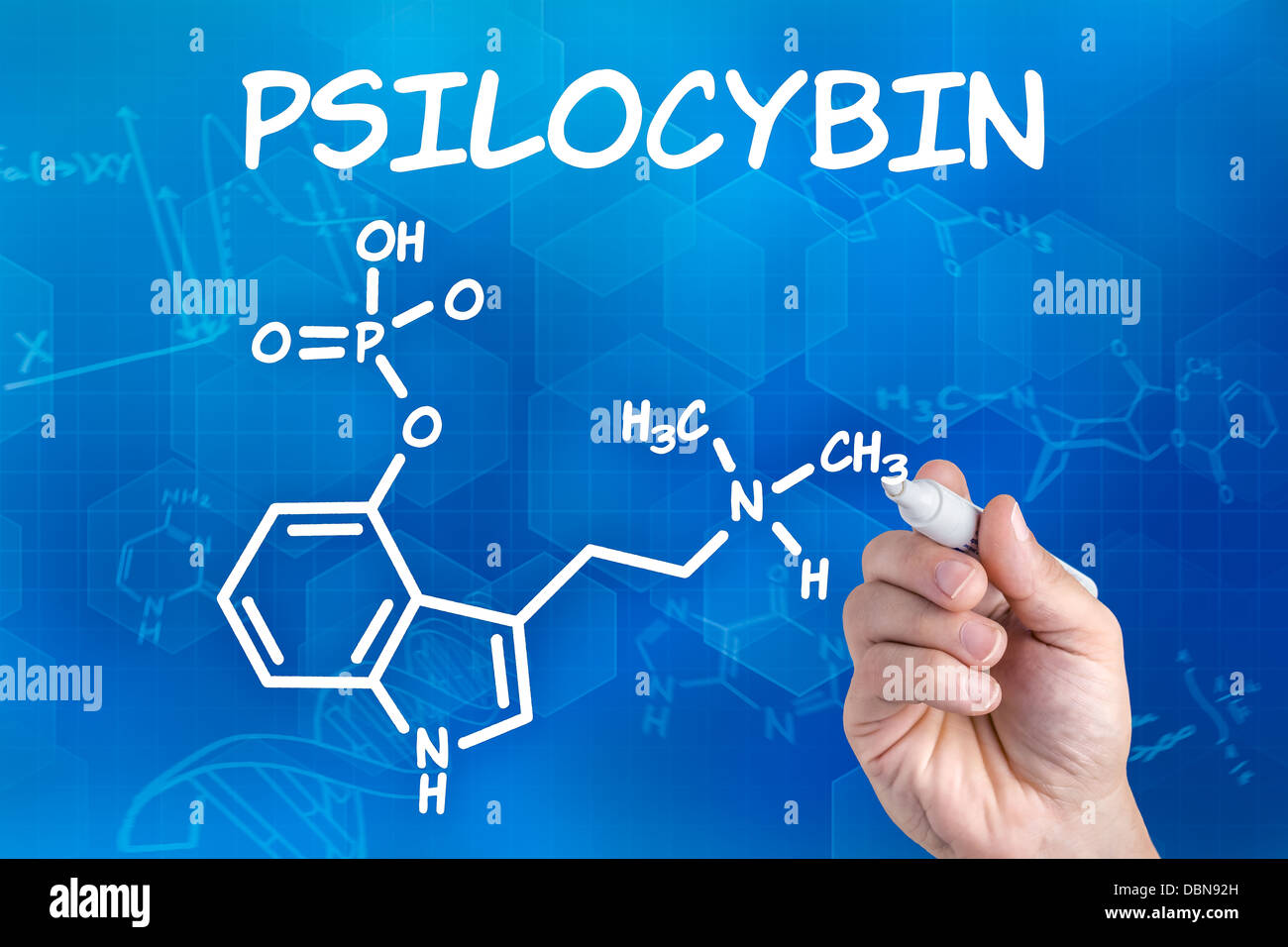 hand with pen drawing the chemical formula of psilocybin Stock Photo ...