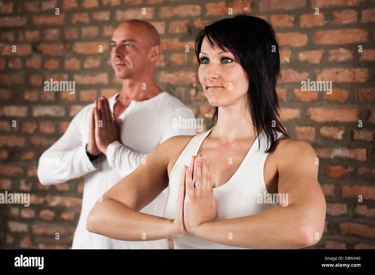 Couple Practising Yoga, Portrait Stock Photo - Alamy