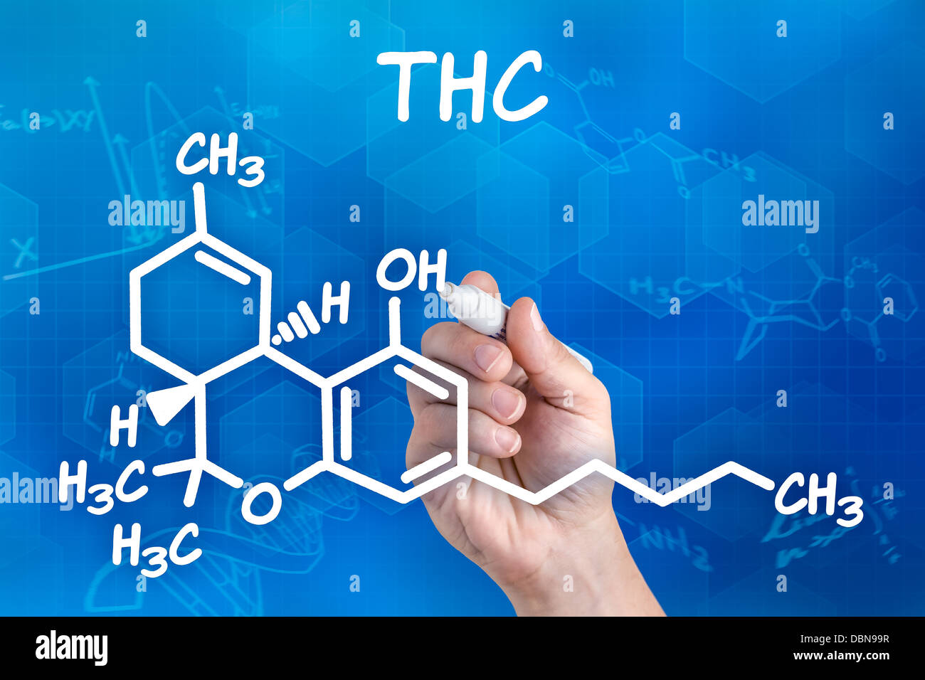 hand with pen drawing the chemical formula of thc Stock Photo - Alamy