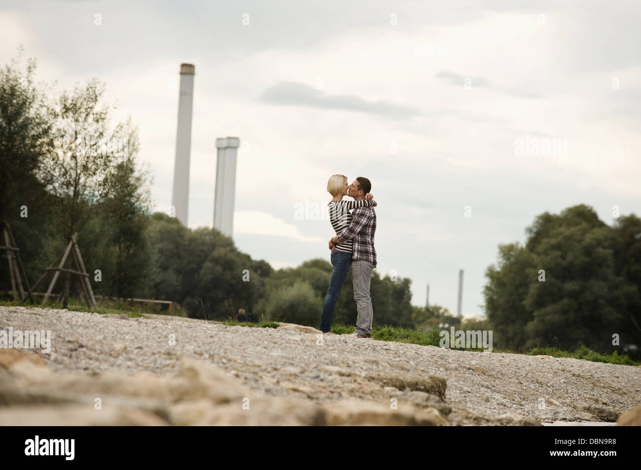 Young couple kissing outdoors, Munich, Bavaria, Germany Stock Photo - Alamy
