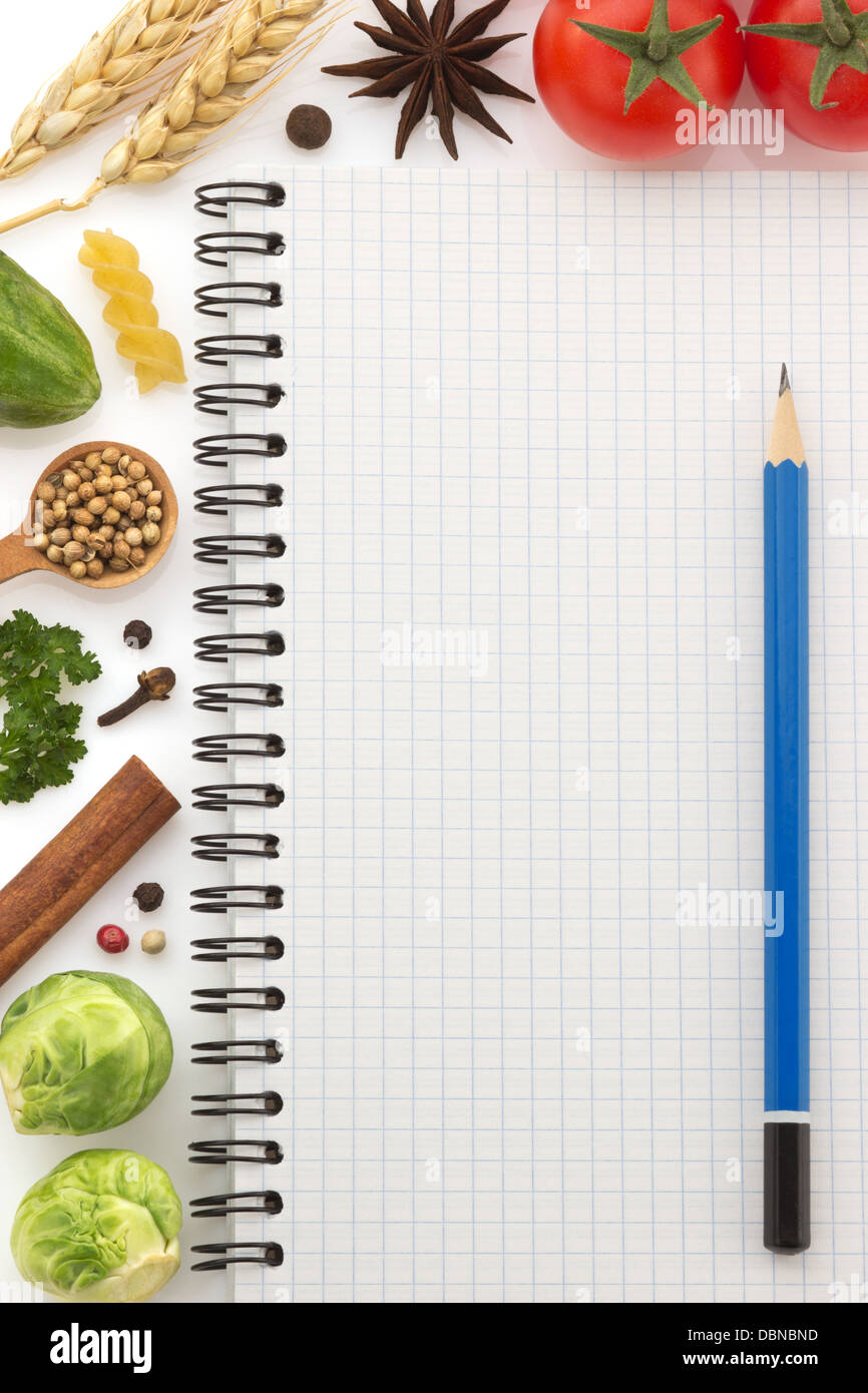 food ingredients and recipe book on white background Stock Photo - Alamy