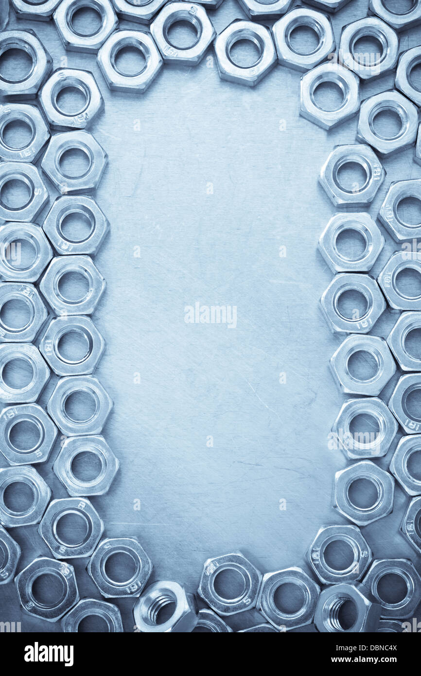 nut tool on metal background texture Stock Photo - Alamy