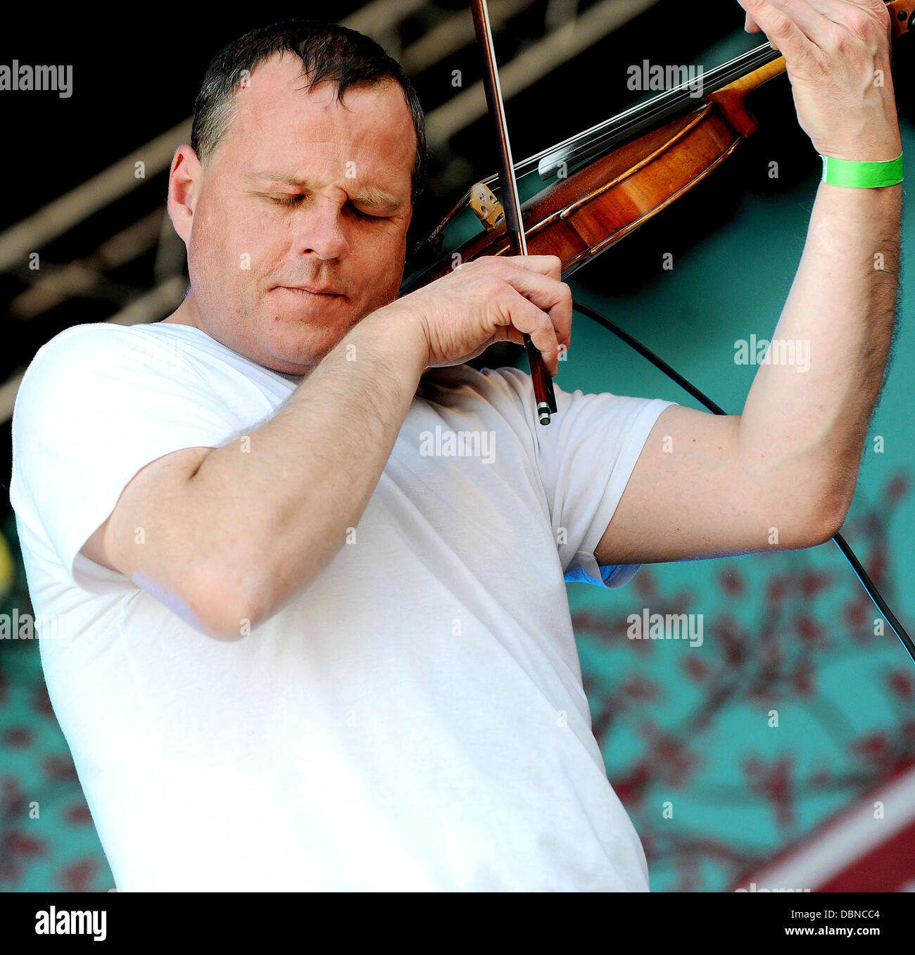 Andy Dinan of Adrian Edmondson & The Bad Shepherds performs on stage at ...