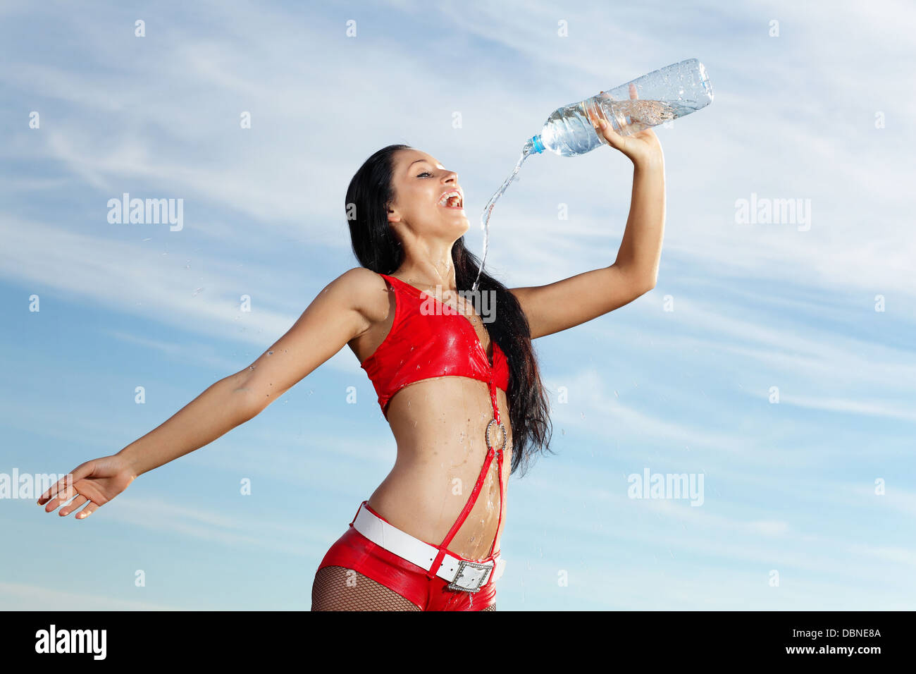Young female sport girl with a bottle of water Stock Photo - Alamy