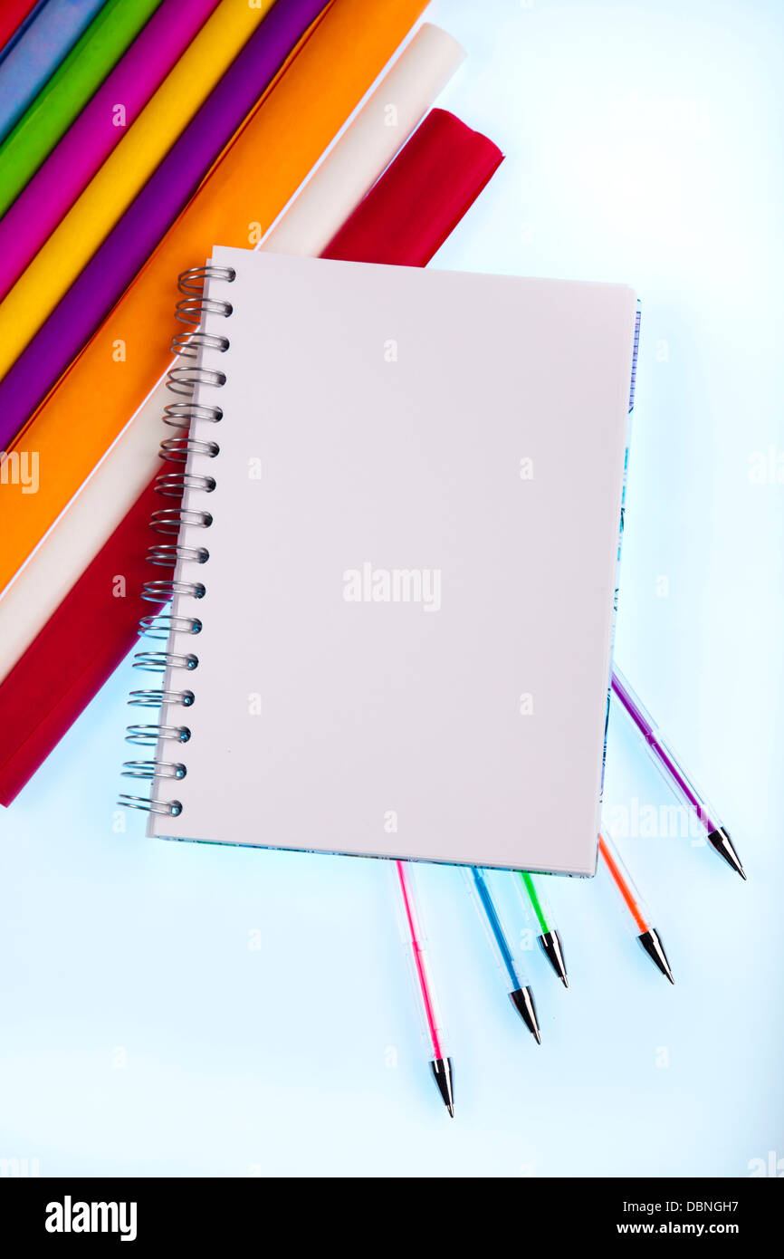 Notepad with school supplies Stock Photo - Alamy