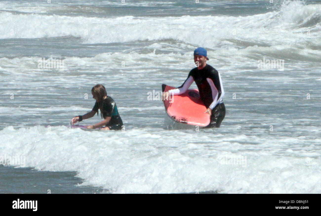 David Beckham bodyboarding on Malibu beach Los Angeles, California - 30 ...