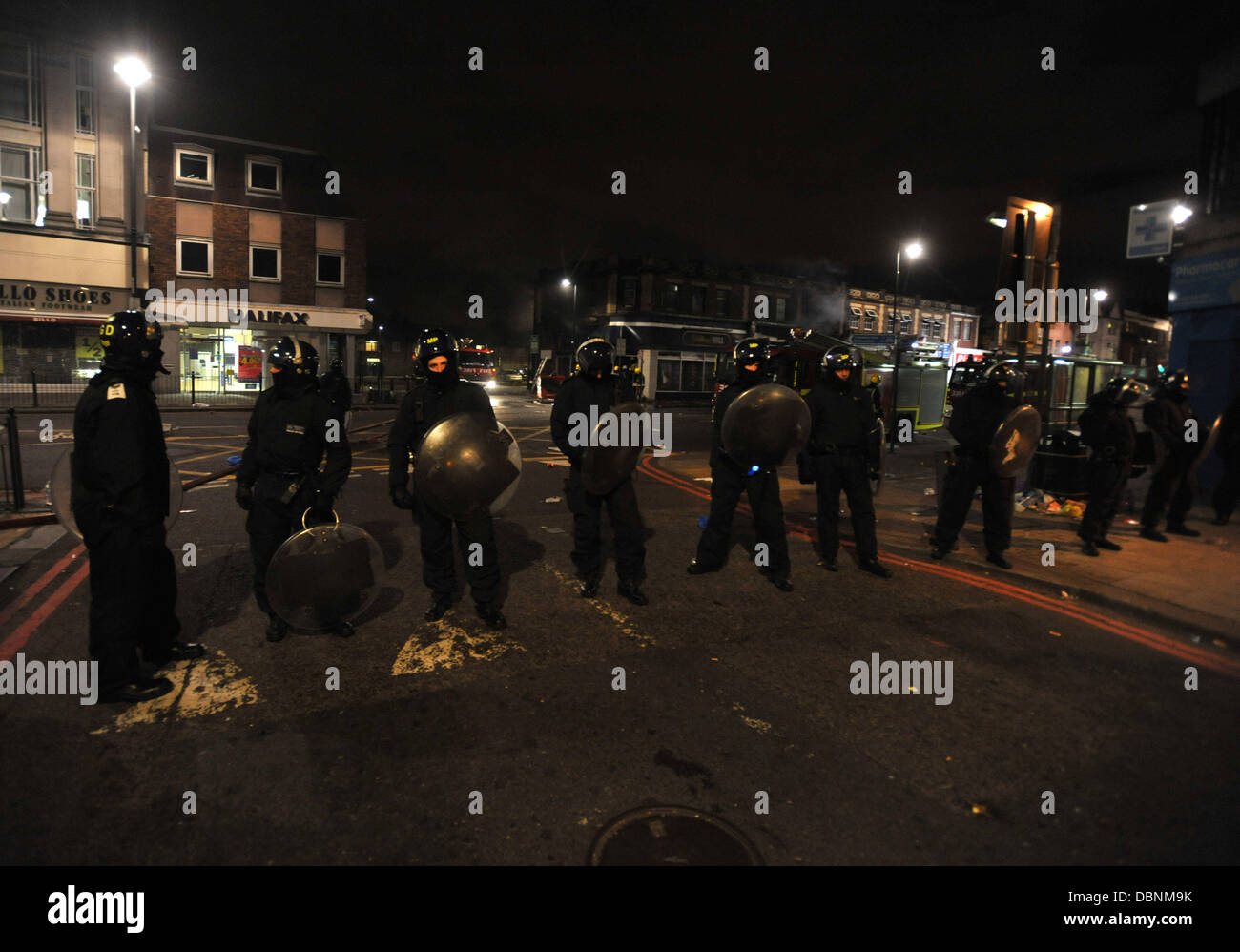 Police cordons are in place as riots break out in North London's ...