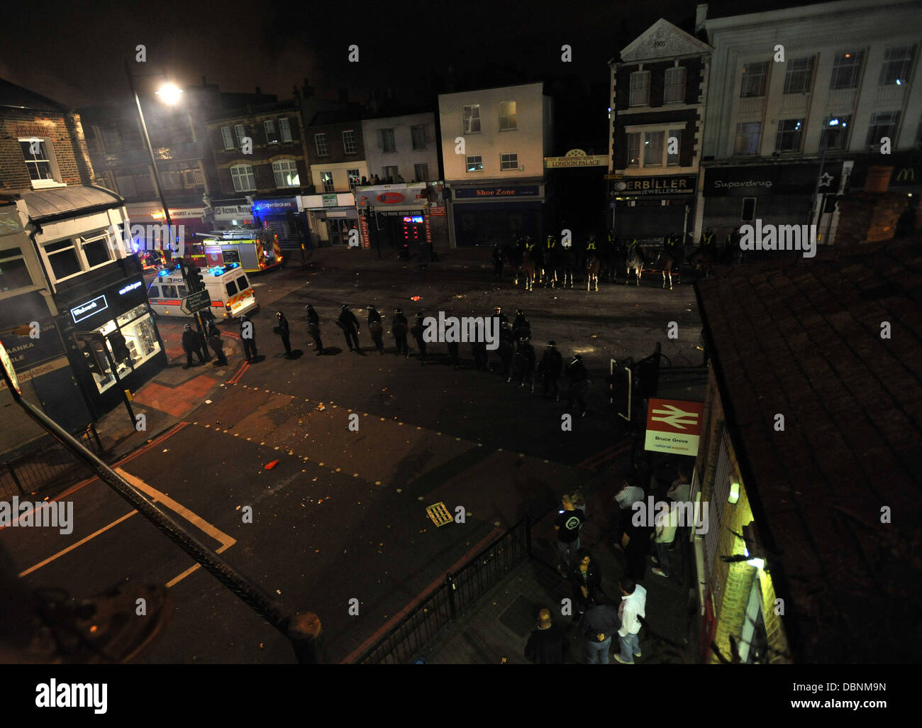 Police cordons are in place as riots break out in North London's ...