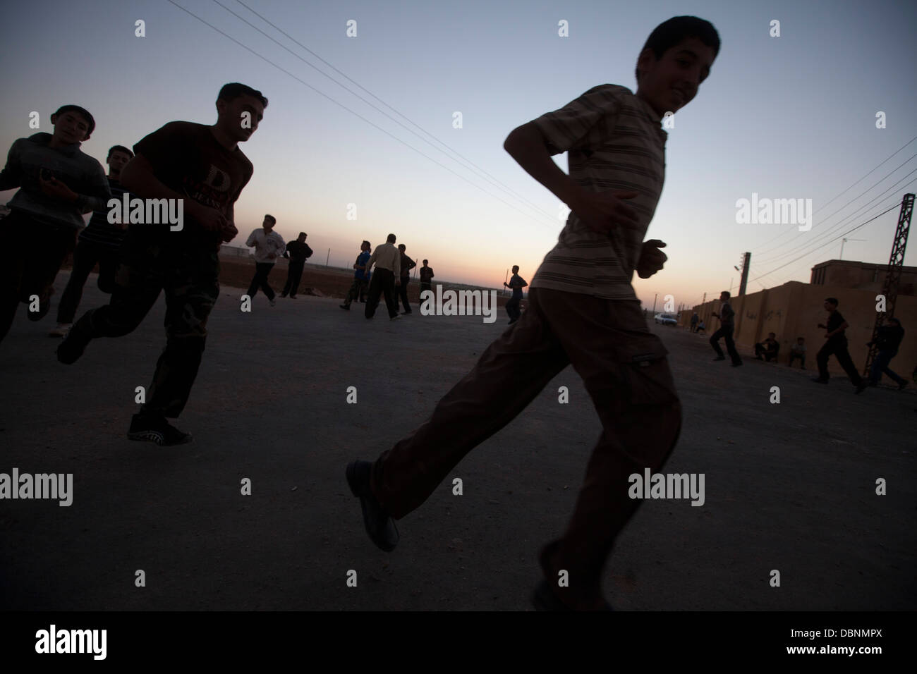 Free Syrian Army youth soldiers attend a training camp in Syria. Their ...