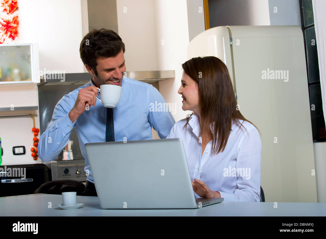 couple drinking coffee before going to work Stock Photo - Alamy