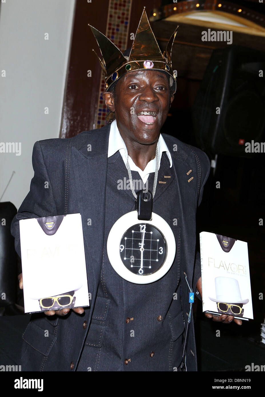 Flavor Flav signs copies of his new book 'Flavor Flav: The Icon The ...
