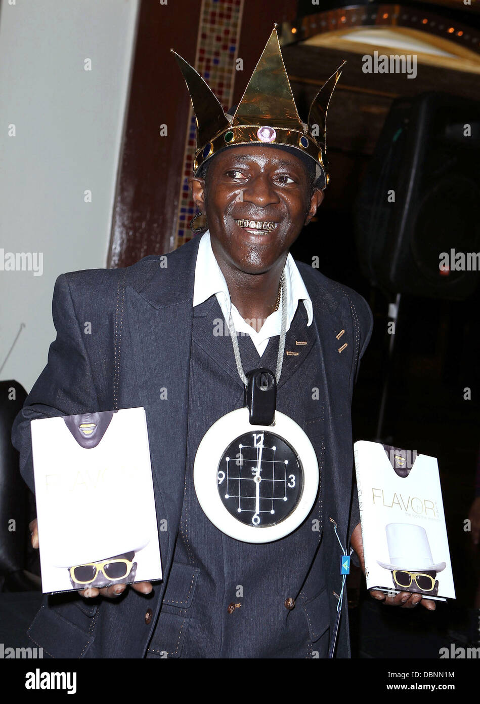 Flavor Flav signs copies of his new book 'Flavor Flav: The Icon The ...