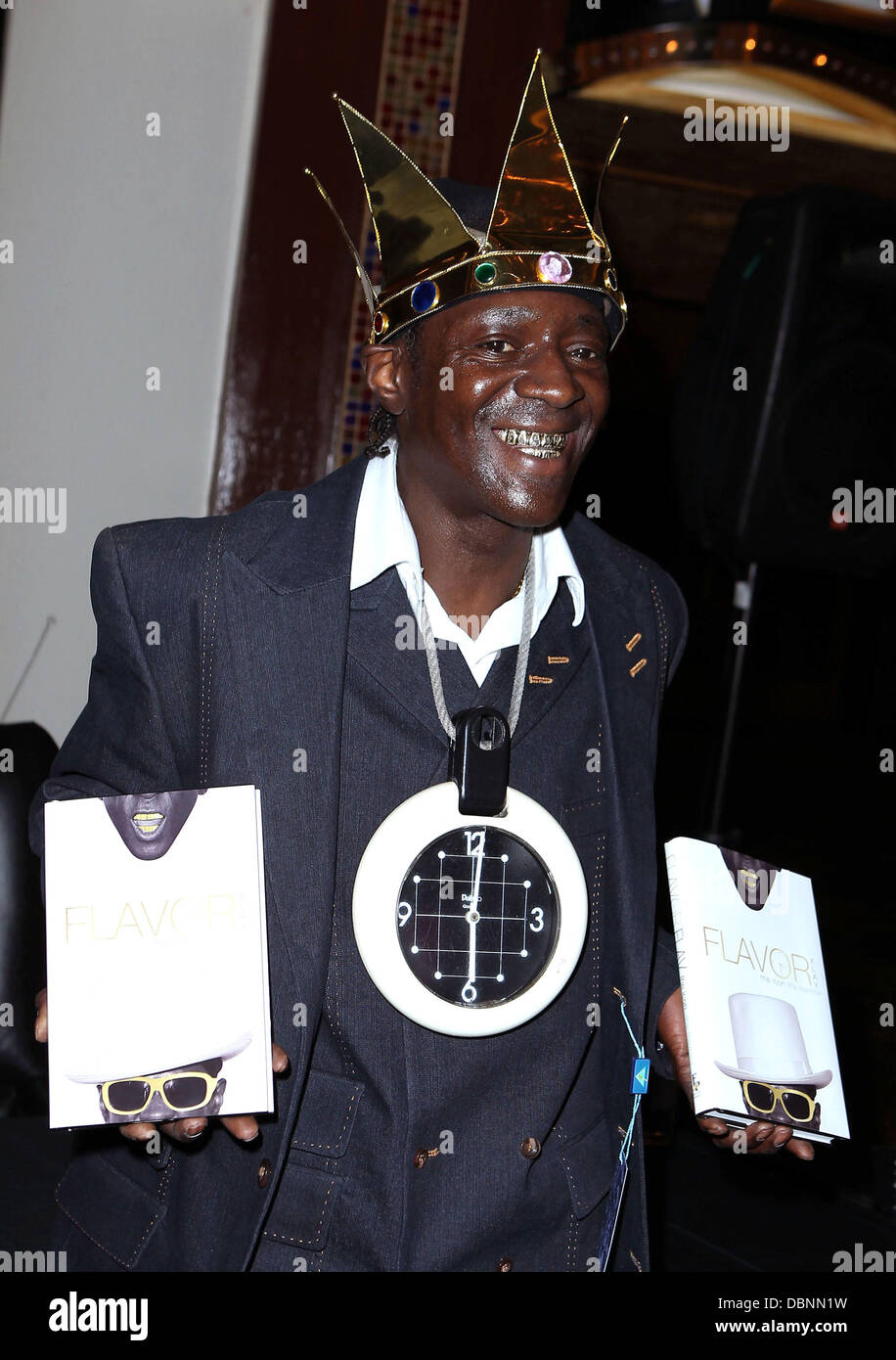 Flavor Flav signs copies of his new book 'Flavor Flav: The Icon The ...