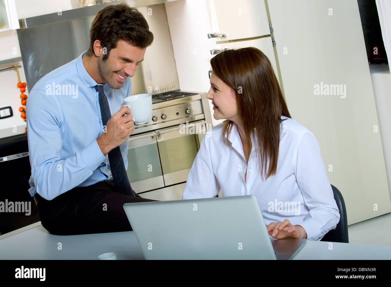 couple drinking coffee before going to work Stock Photo - Alamy