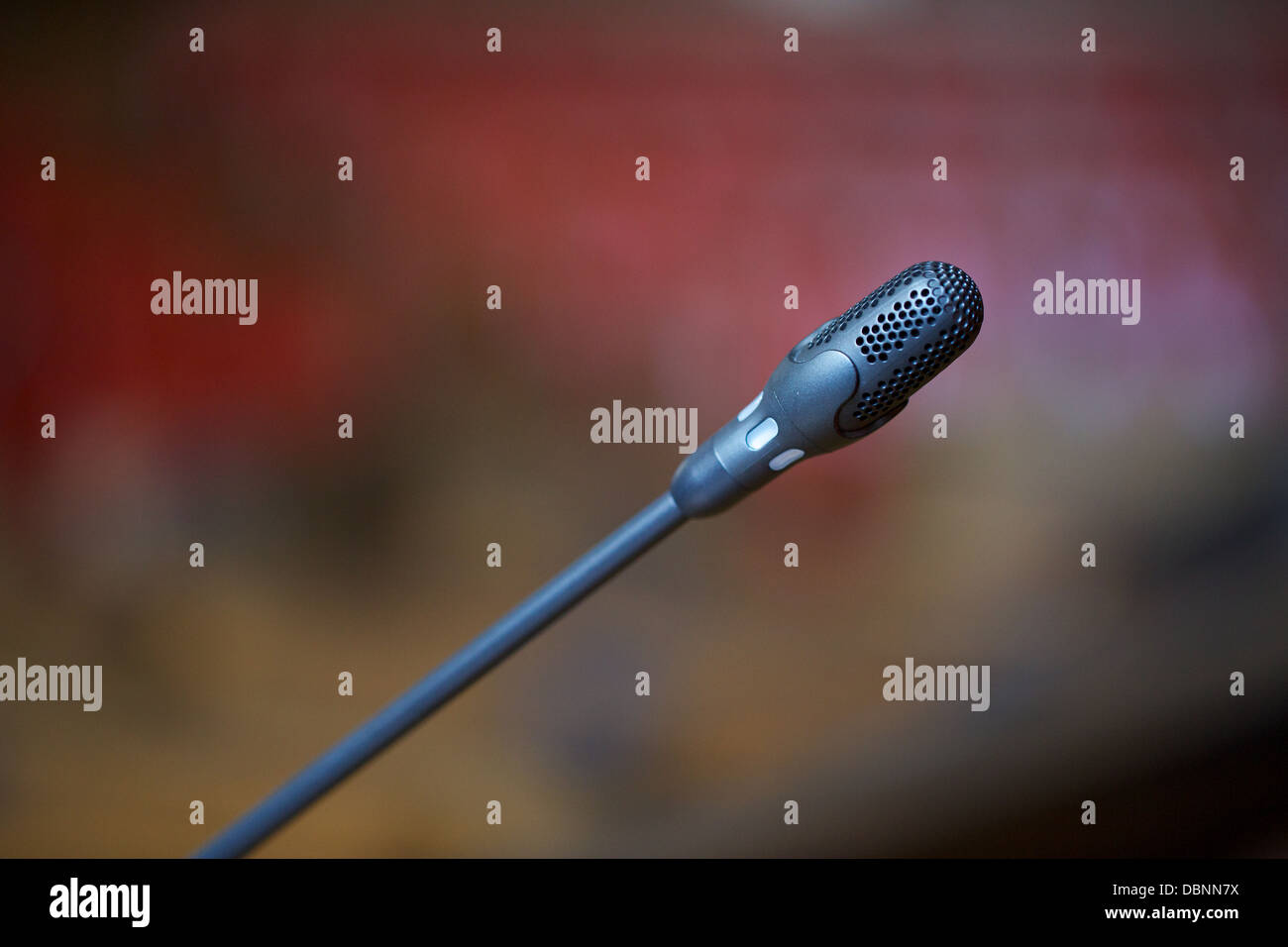 A speaker's microphone in a council chamber Stock Photo - Alamy