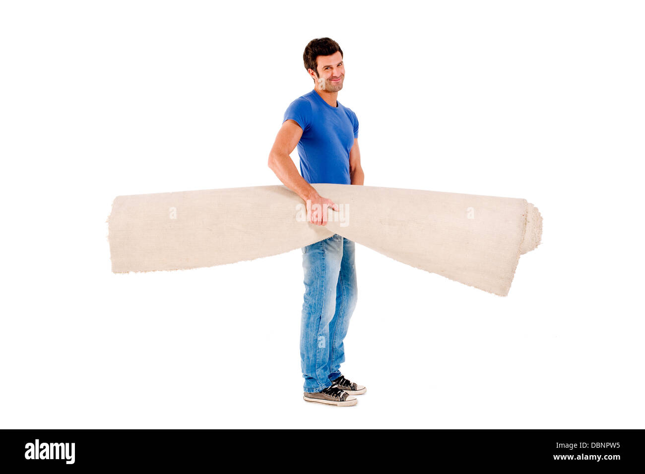man carrying a carpet Stock Photo - Alamy