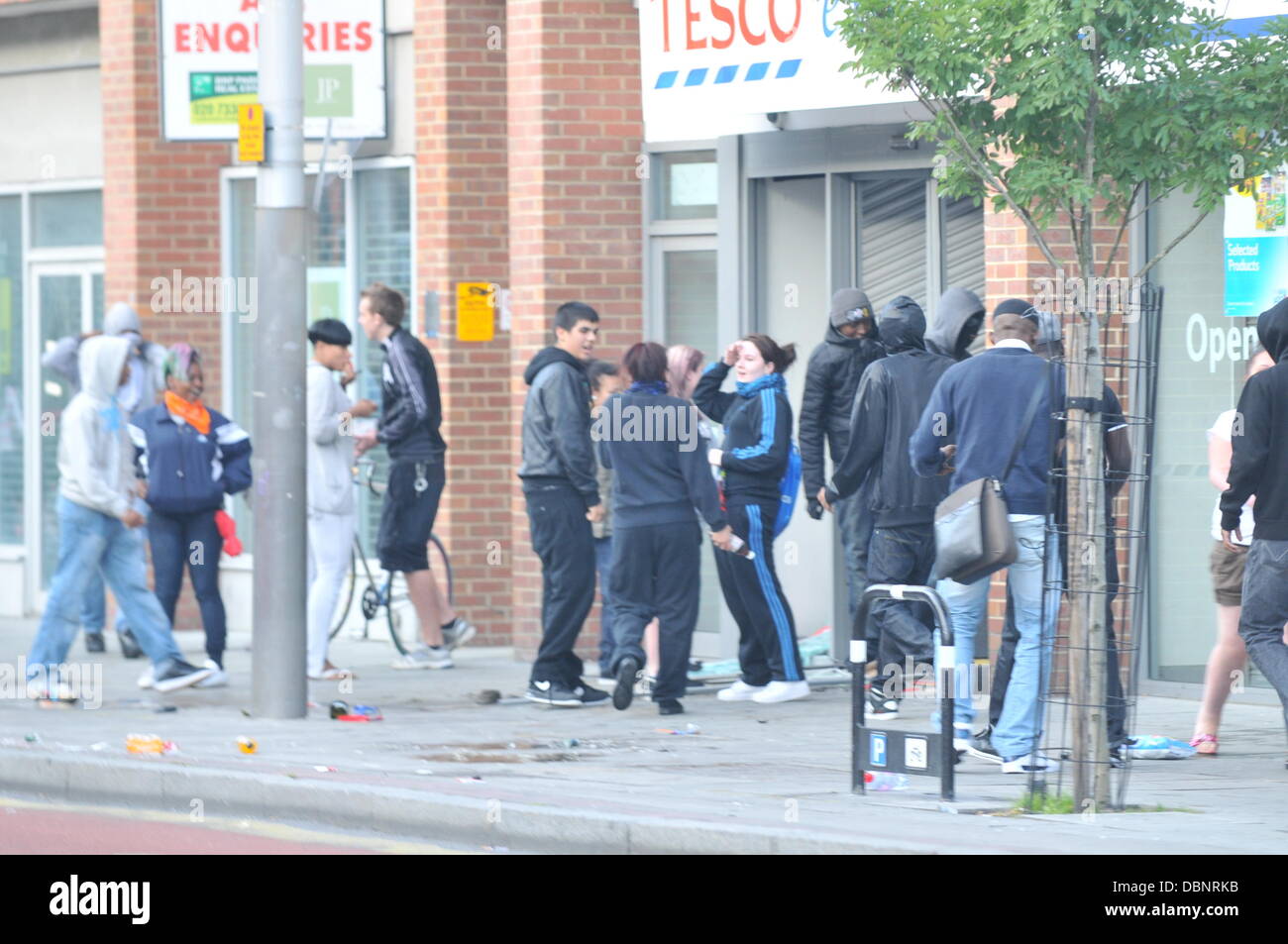 Rioters gather outside a Tesco supermarket in Rye Lane but no sign of ...